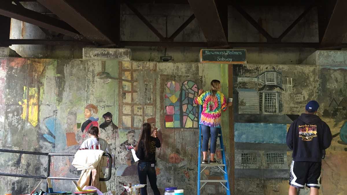 Photos: Saranac Lake River Walk mural repainting