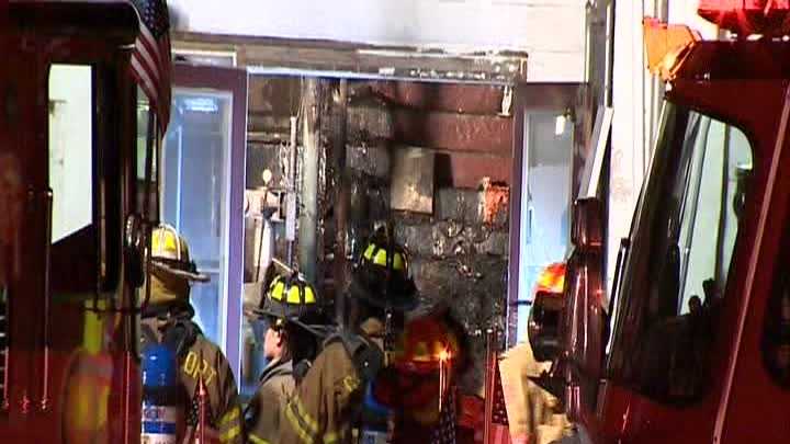 Investigation under way in hubcap shop fire