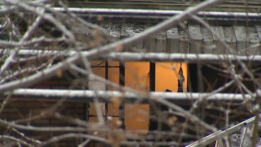 Slideshow: Firefighters battle flames at deadly house fire