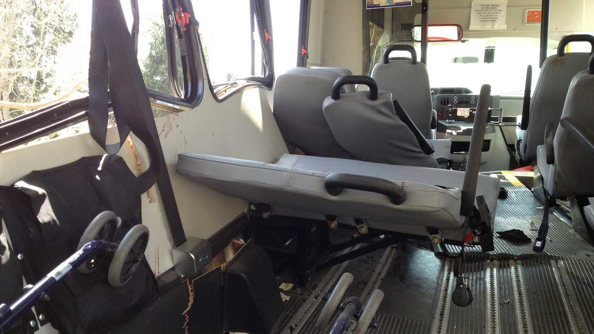 In photos: Train hits bus