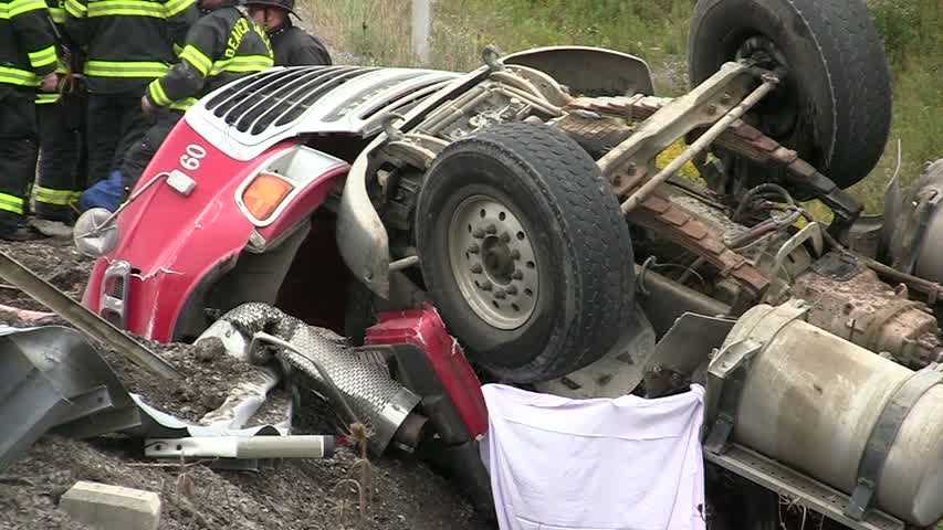 Cement mixer driver dies in rollover (Photos)