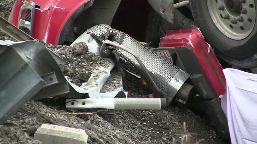 Cement mixer driver dies in rollover (Photos)