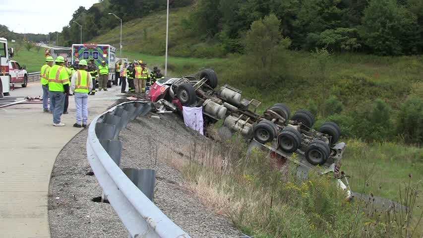 Cement mixer driver dies in rollover (Photos)