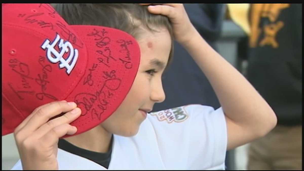 Photos: Boy meets baseball stars after getting beaned