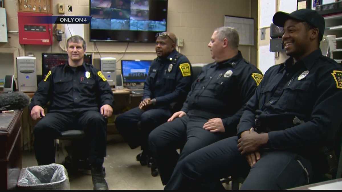 Hero officers rescue woman from burning home