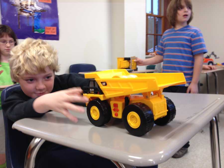 Toy truck drive collects holiday gifts in boy's honor after zoo death