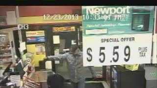 Photos: Surveillance video shows armed robbery at EZ Mart