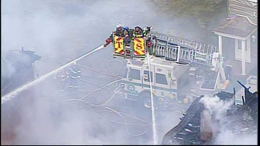 Photos: 2 homes catch fire in North Huntingdon