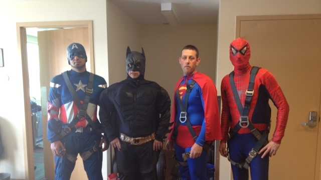 (PHOTOS) Superhero window-washers thrill Children's Hospital patients again