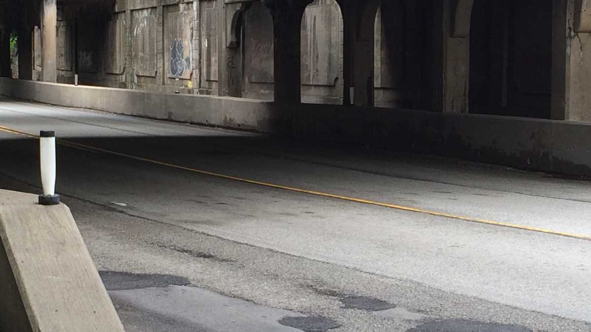 Photos: Concrete chunks fall from overpass