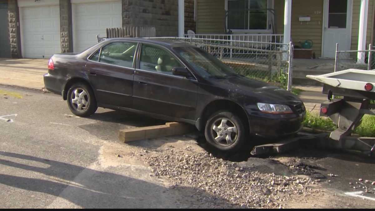 Water line rupture takes part of street with it in Beltzhoover