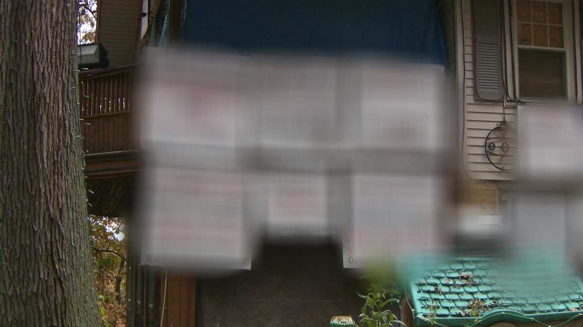 Offensive signs and "trashed" figurines surround a home once a holiday ...