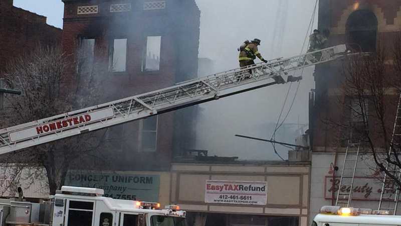 Photos: Homestead fire tears through stores, apartments