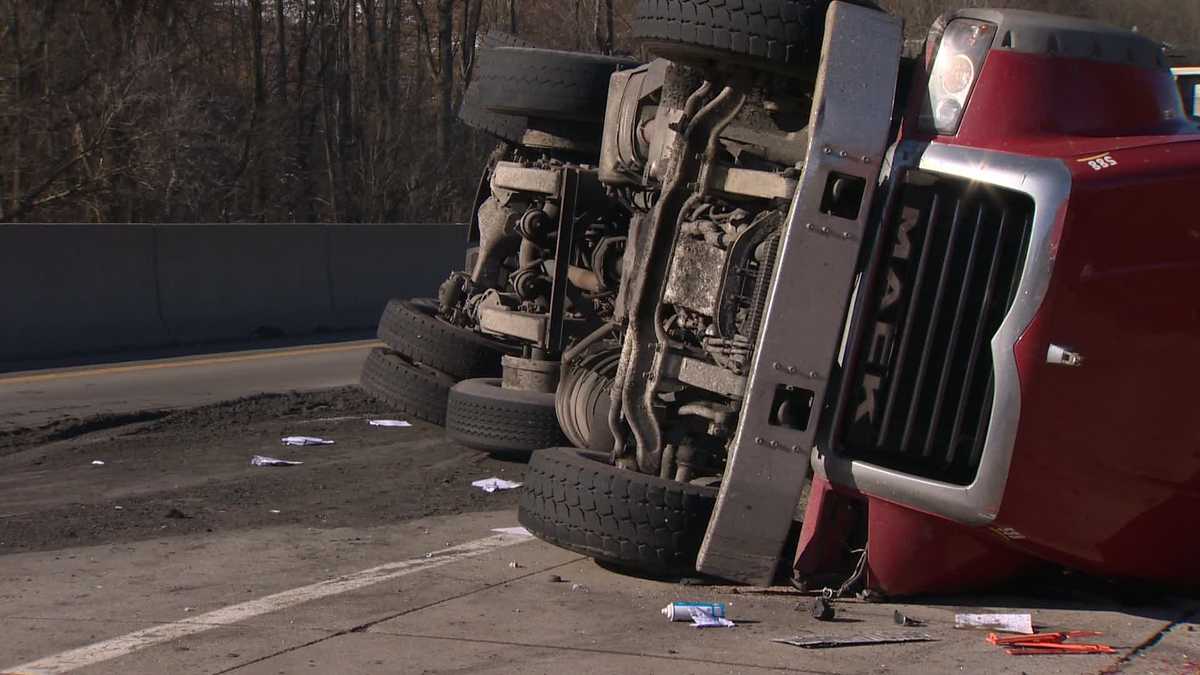 Photos: Tri-axle truck crashes on Route 22, lands on side