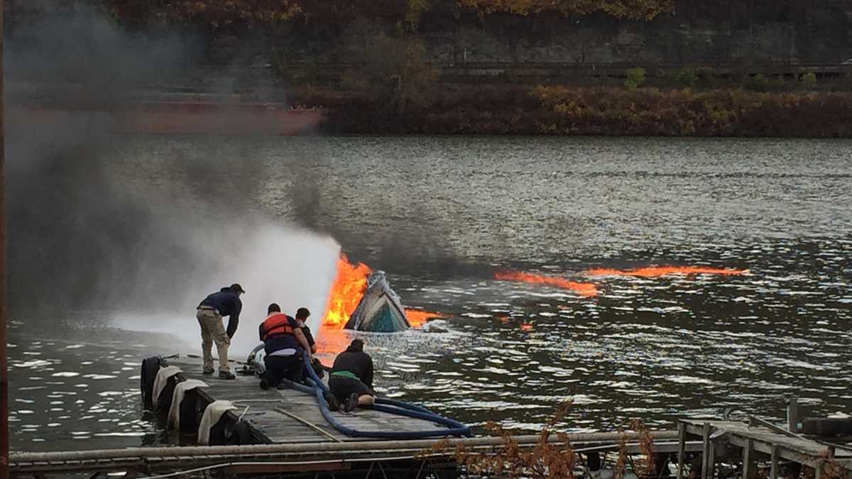 Photos: Fire tears through boat near West End Bridge