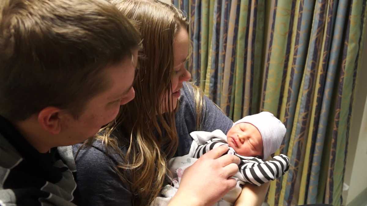 Impatient baby delivered in hospital parking lot