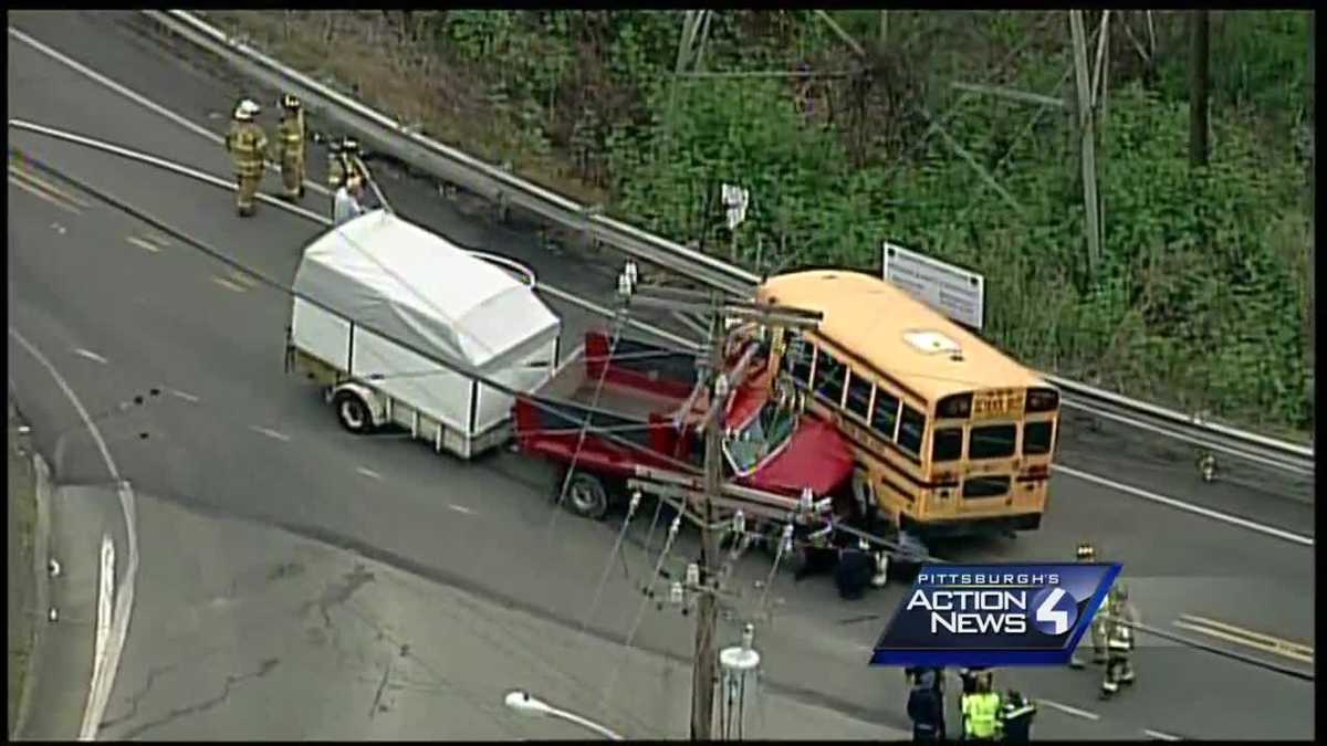 Dump truck, school bus crash in Trafford