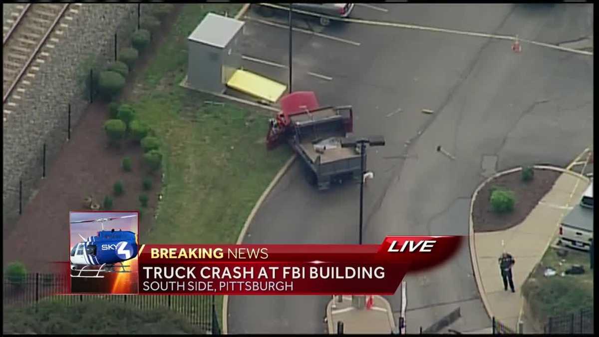 Photos: Dump truck driver rams front gate of Pittsburgh FBI building