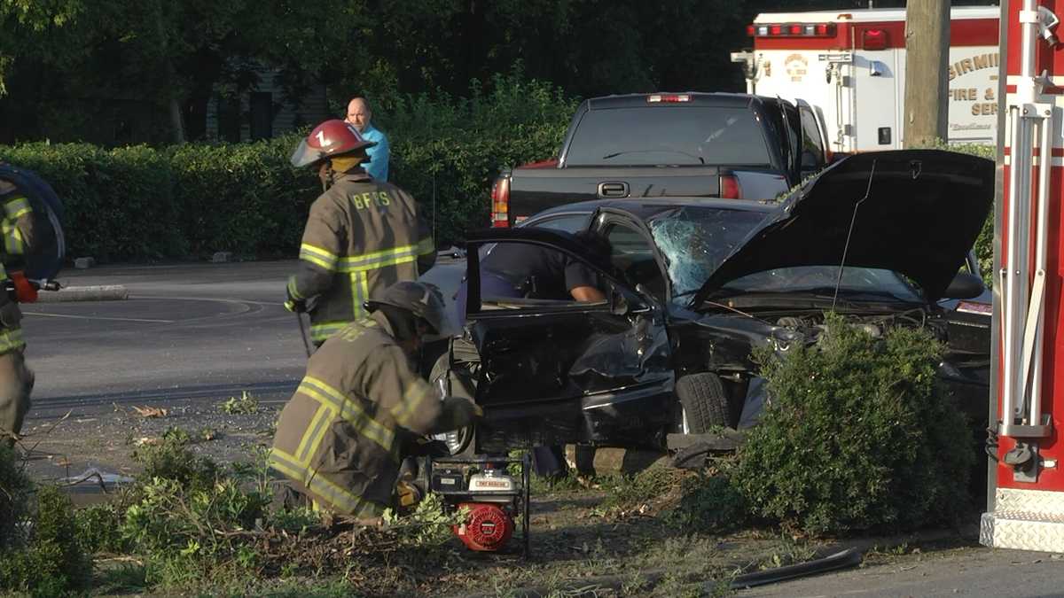 Car collides with pickup truck