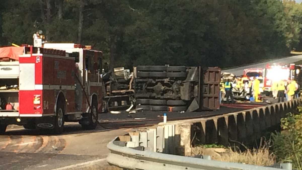 One dead after crash with asphalt truck