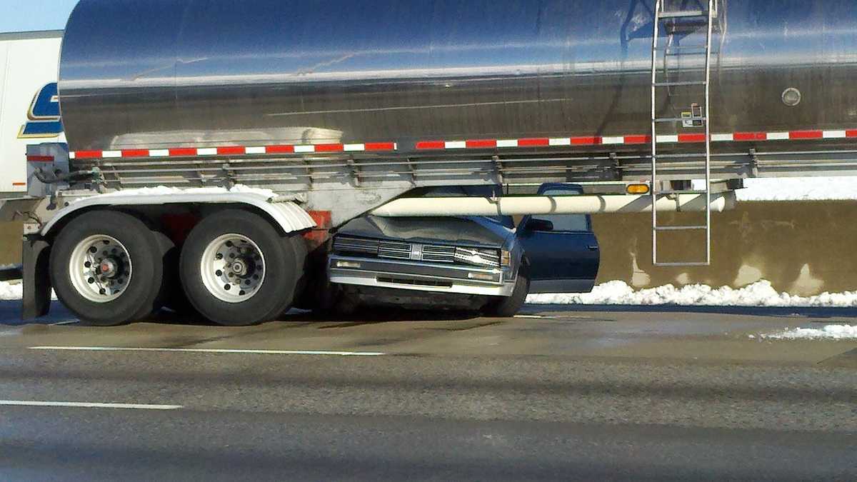 Car pinned under big rig in I-40 crash