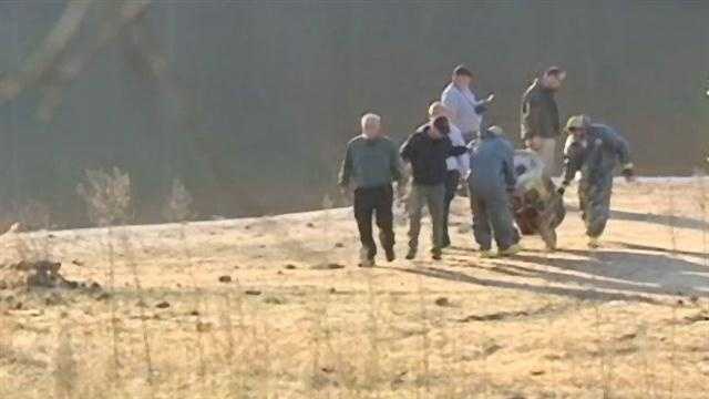 Timeline slideshow: Bodies found in barrels; men charged