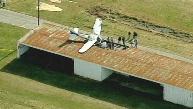 Plane crashes into roof