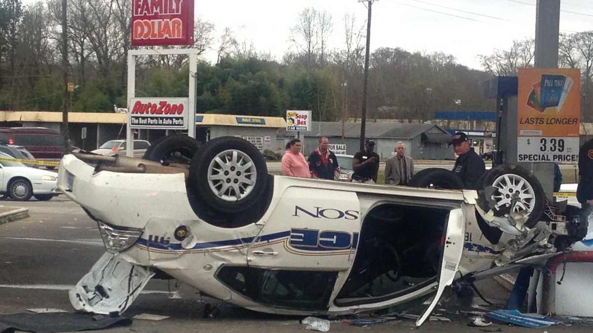 Police car overturns during wreck, other driver leaves scene