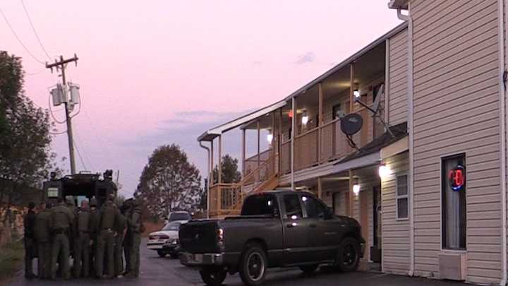 SWAT team uses 'flash bang' to take suspect into custody at motel