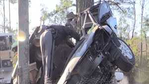 Pictures: Crash ends with car wrapped around tree