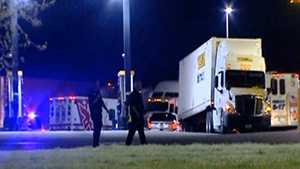 Coroner: Truck driver run over by tractor-trailer