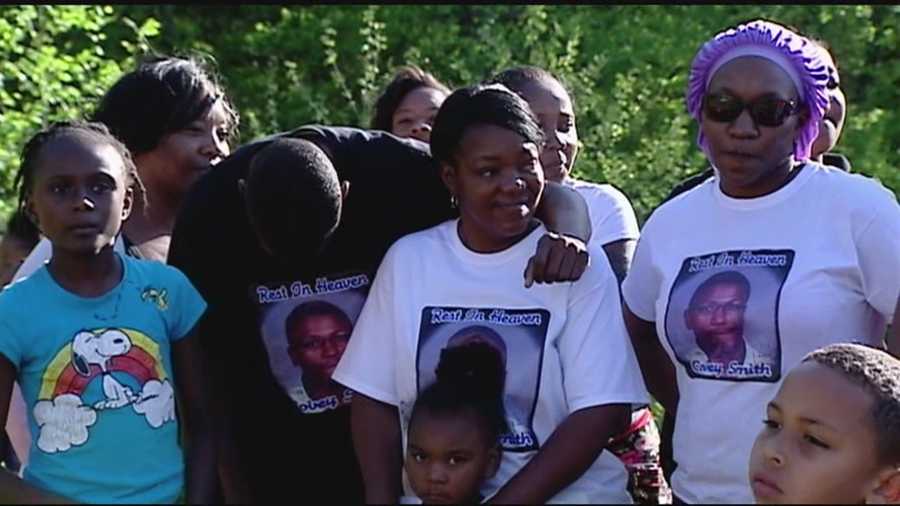Friends and family march for a gunned-down 16-year-old