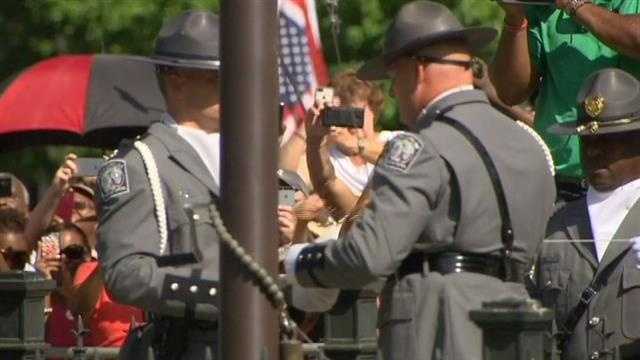 Video of flag being removed from Statehouse from ground and Sky 4