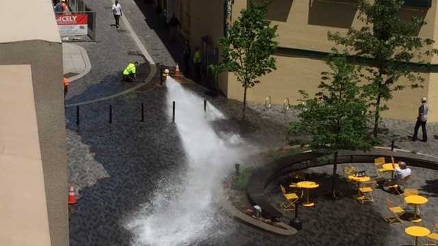 Broken hydrant spews gallons of water, floods downtown businesses