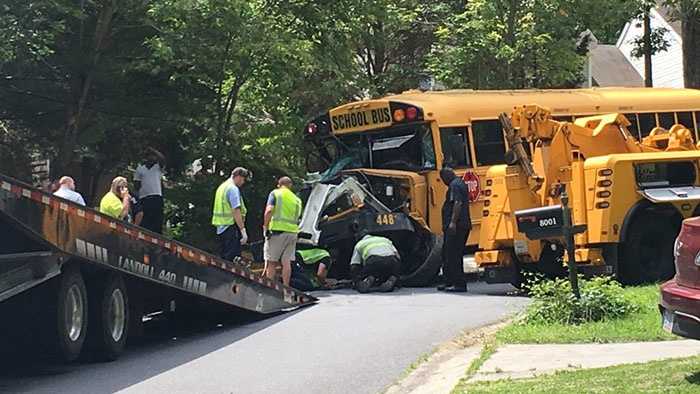 Bus driver swerves to avoid cat, crashes into home, injures 14 students ...