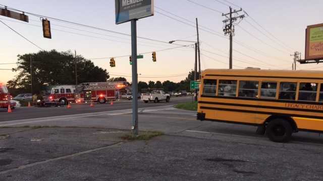 Motorcycle, school bus involved in crash in Greenville, police say