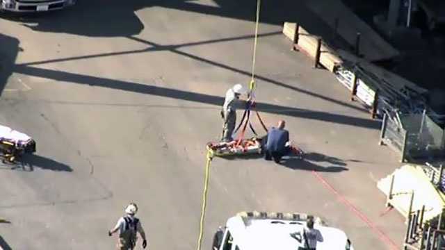 Pictures: Worker rescued after falling from scaffolding