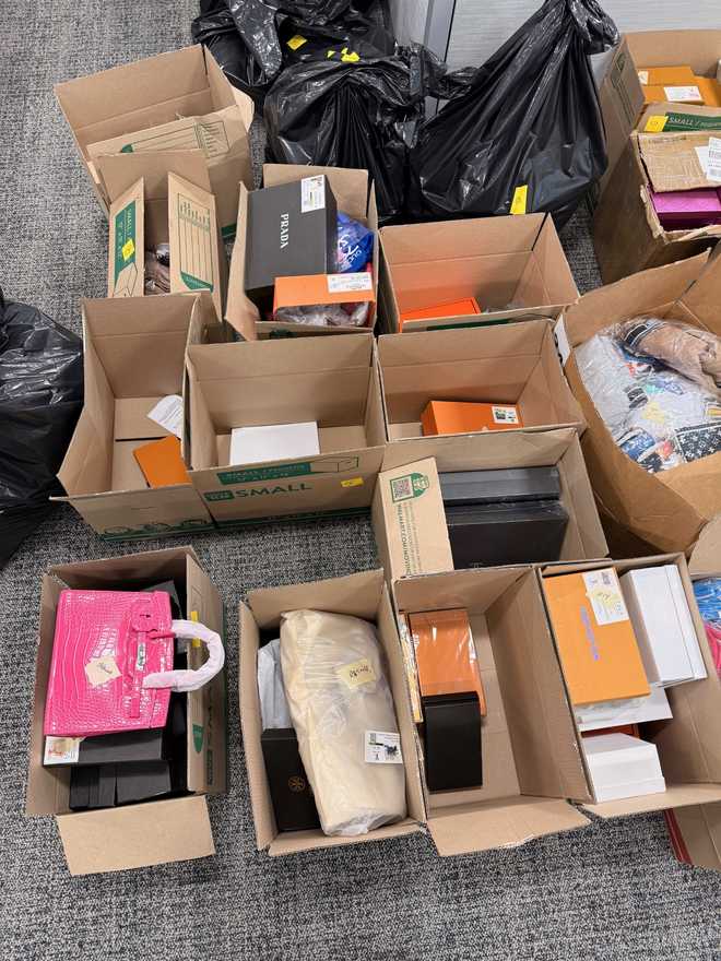 2 arrested in counterfeit designer goods operation