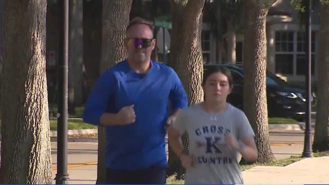 Teen defies odds, runs marathon with her dad in West Palm Beach