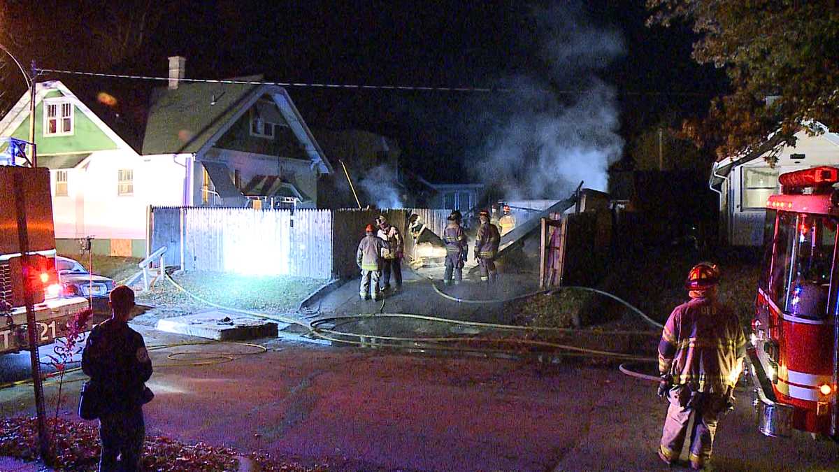 Omaha homes damaged in garage fire