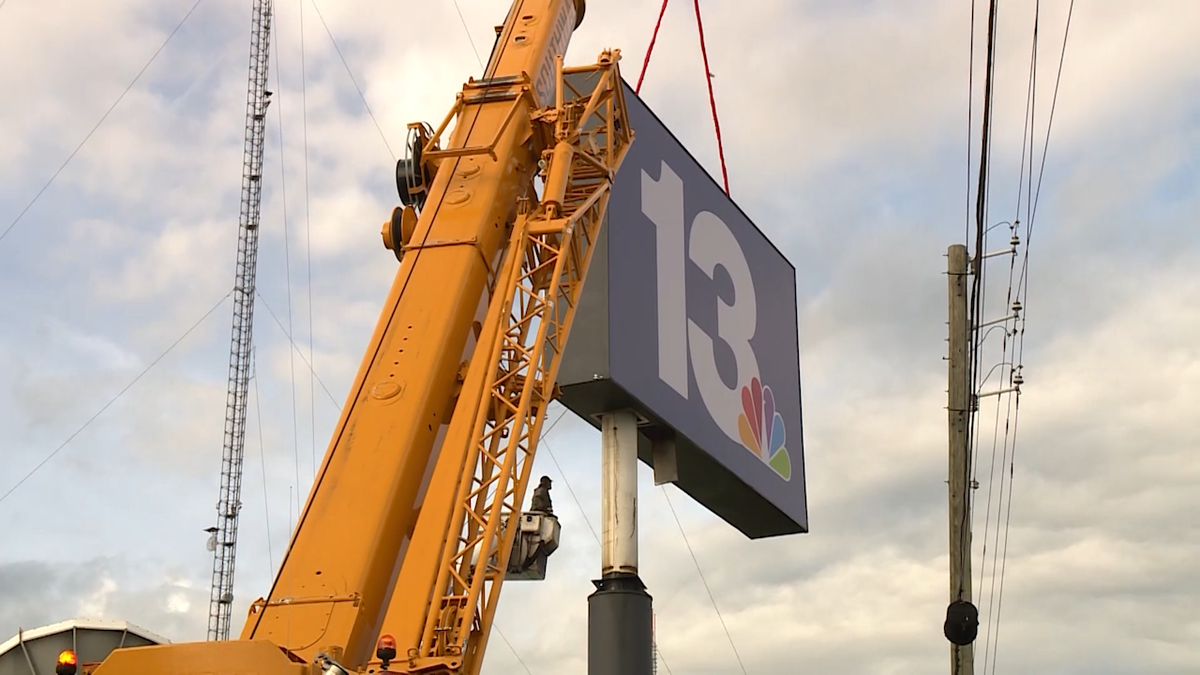 New WVTM 13 sign goes up atop Red Mountain in Birmingham