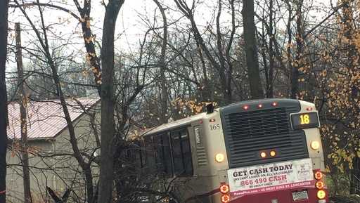 Red Rose Transit bus veers off road into wooded area