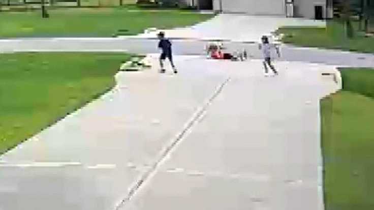 Dramatic video: Teenager rescues 6-year-old neighbor from dog attack
