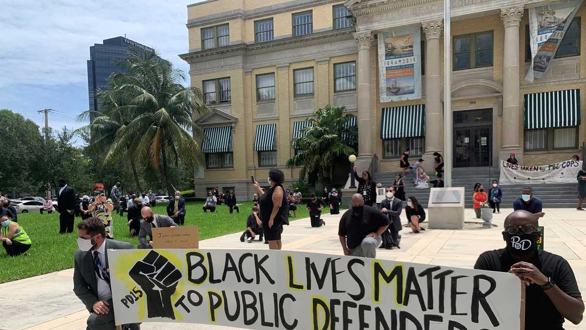 Palm Beach Co. public defenders hold protest in West Palm Beach