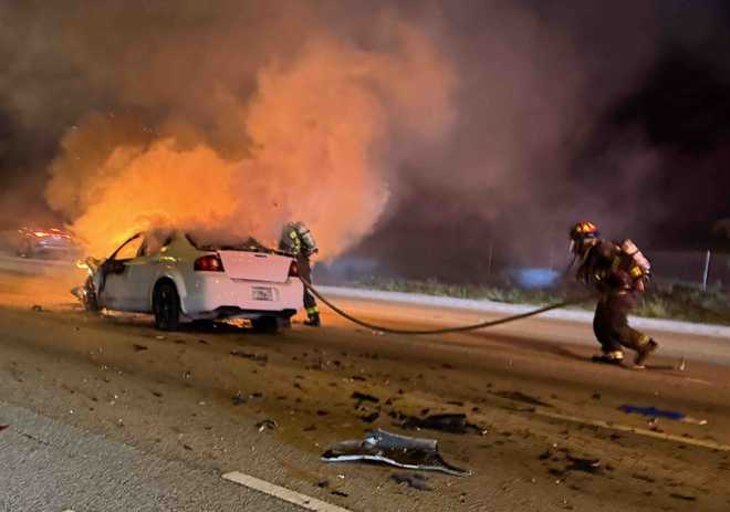 Four vehicle crash on I-95 causes one to burst into flames