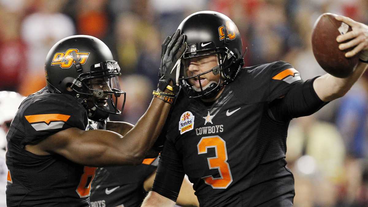 2011 OSU football team eases into second round of KOCO 5 March Madness