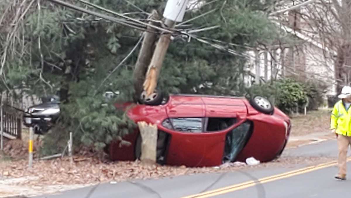 Police searching for driver after crash downs power line