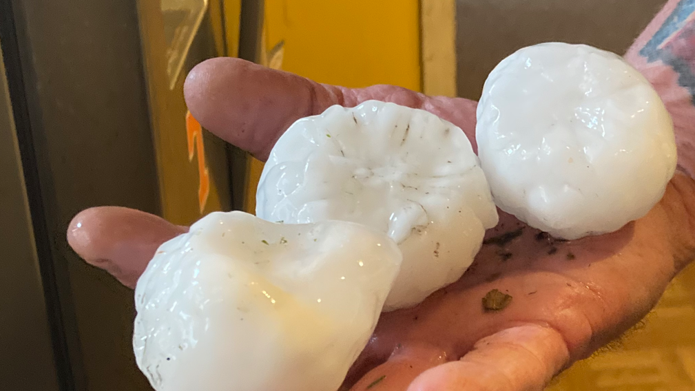 Iowa weather: Photos of hail that fell in Sunday storms
