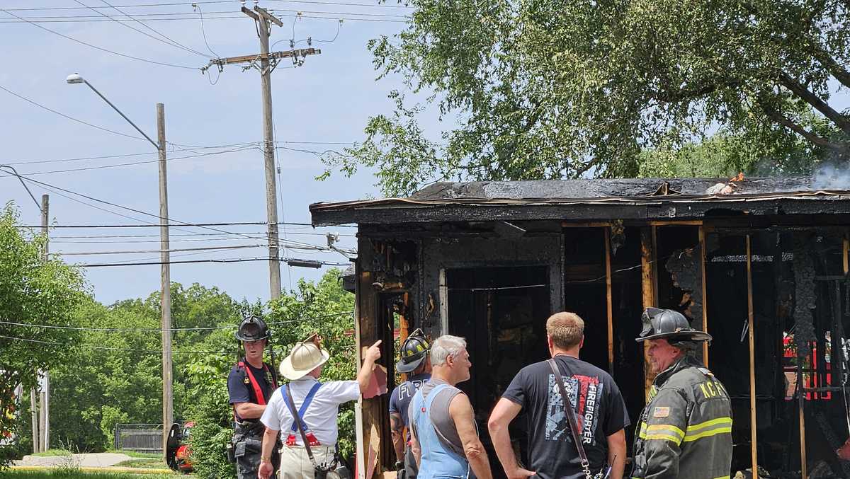 Kansas City Fire Department battles house fire at E. 77th Street