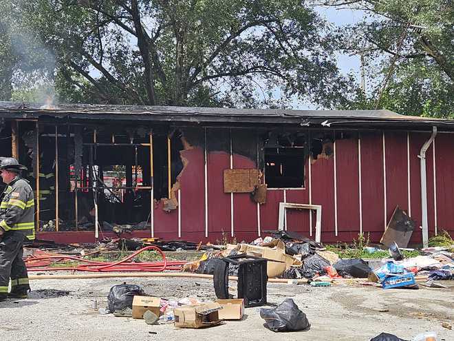 Kansas City Fire Department battles house fire at E. 77th Street